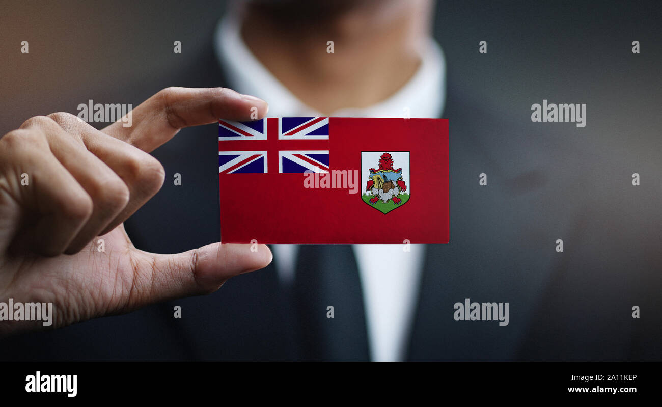 Businessman Holding Card of Bermuda Flag Stock Photo - Alamy