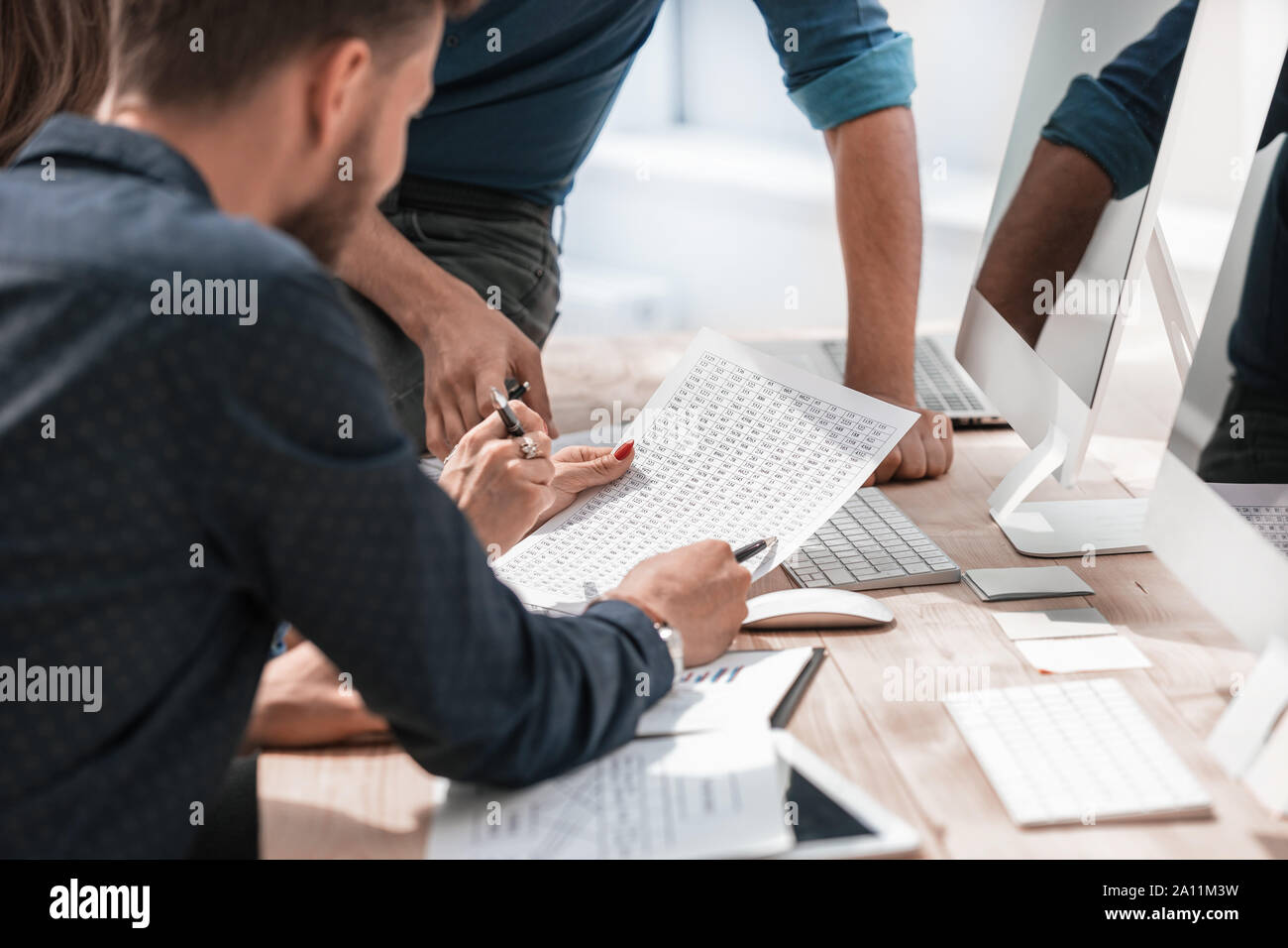 close up. professional staff checking business documentation Stock ...