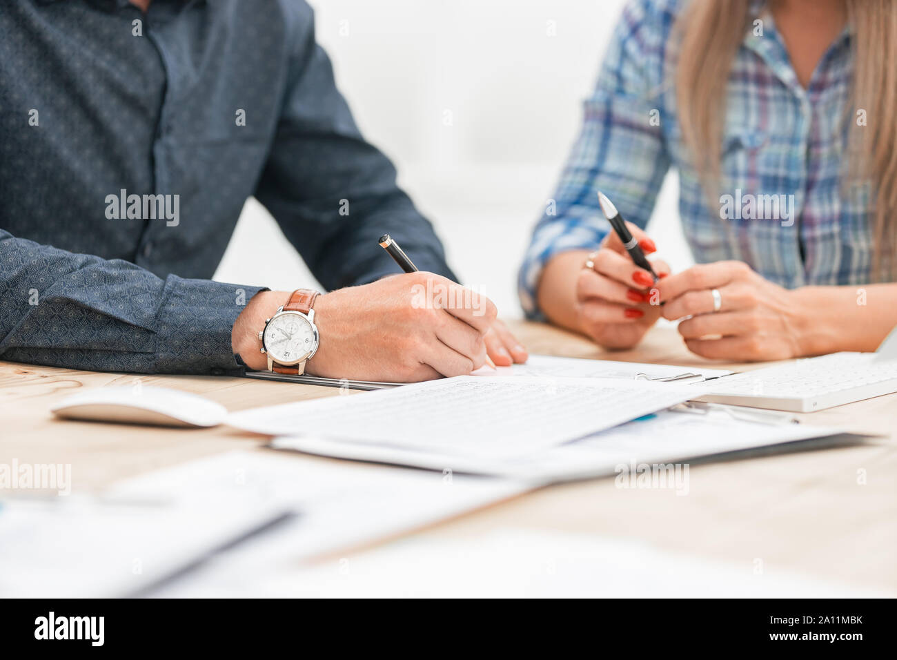 Woman desk signing documents close up hi-res stock photography and ...