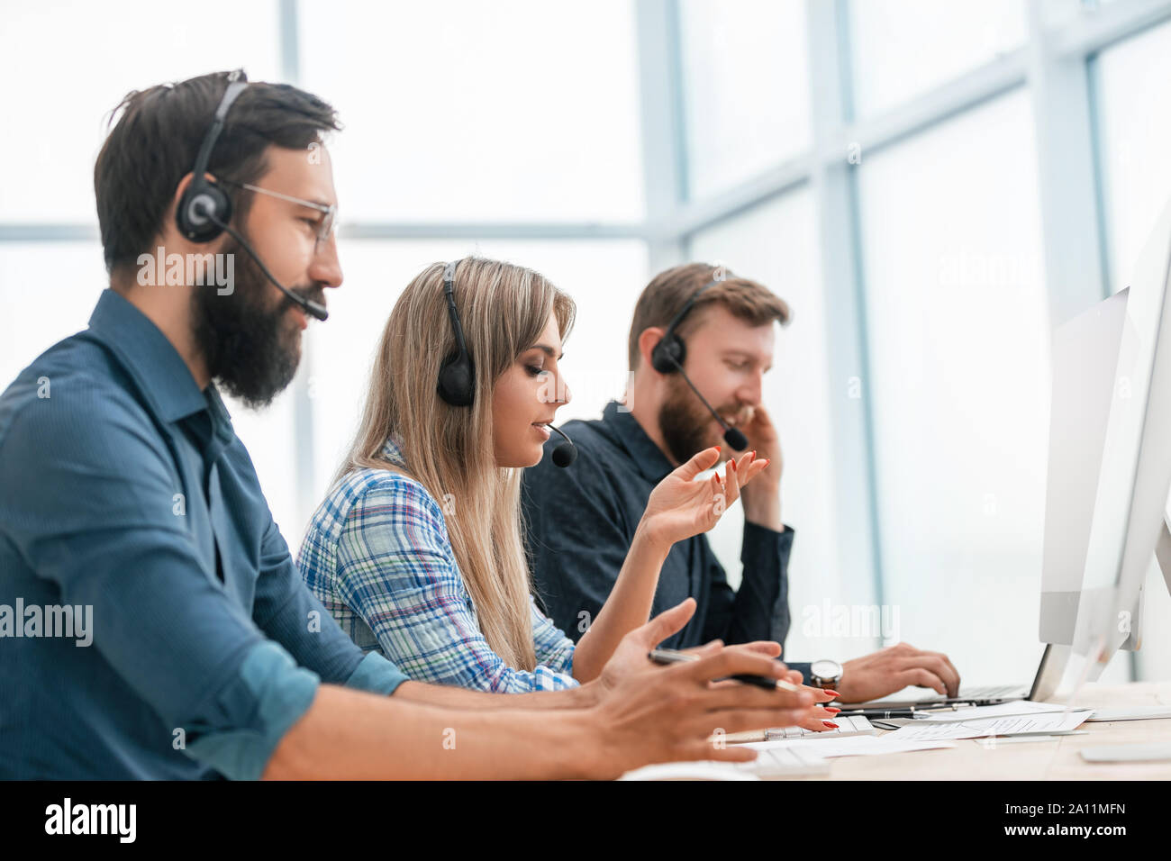 Team call center operators in hi-res stock photography and images - Alamy