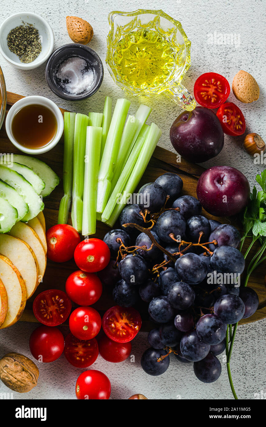 veggie serving table with snacks with vegetables, fruits, baba ganoush ...