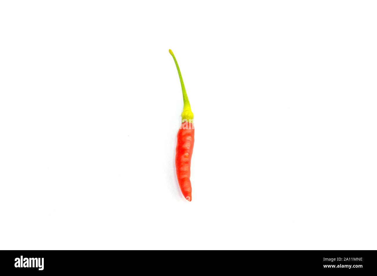 Chili peppers from a white background Stock Photo - Alamy
