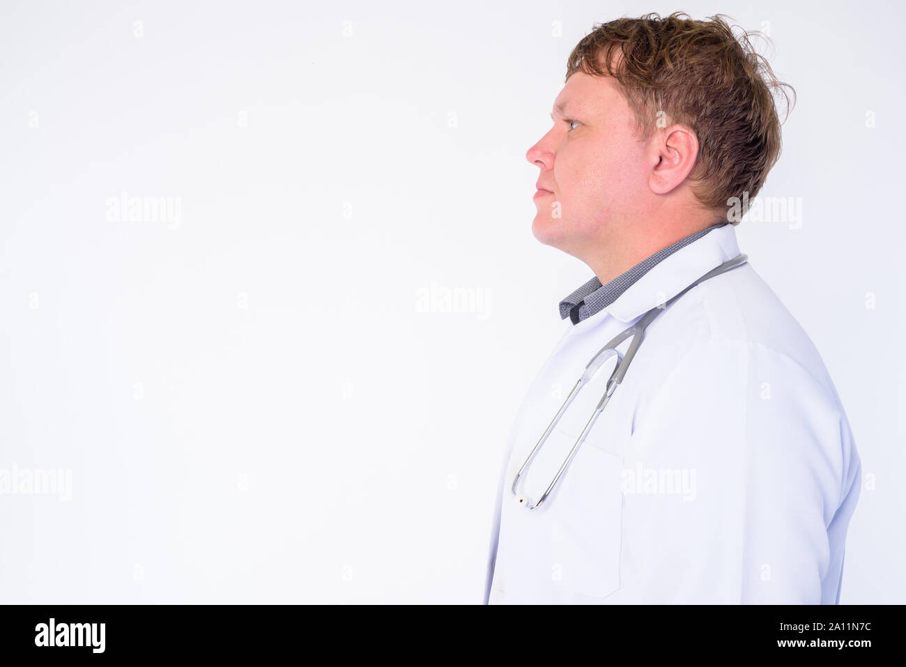 Closeup profile view of overweight man doctor Stock Photo - Alamy