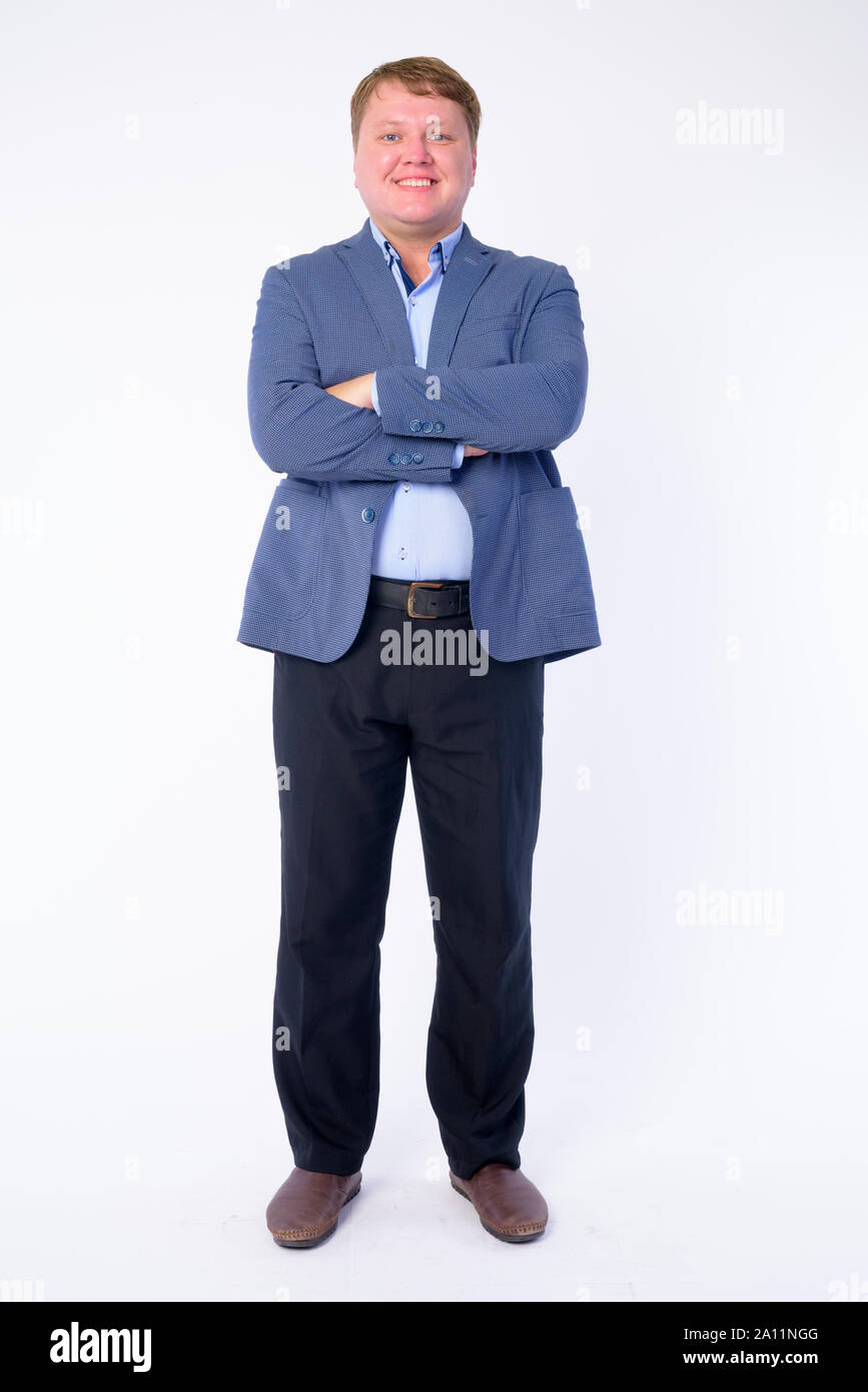 Full body shot of happy overweight businessman smiling with arms ...