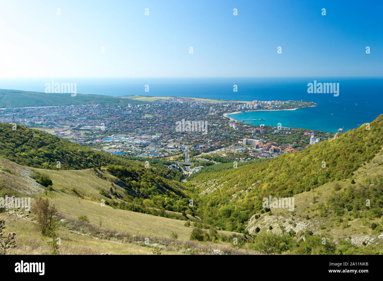 Aerial view of Gelendzhik resort city and sea bay. Day, Velvet season ...