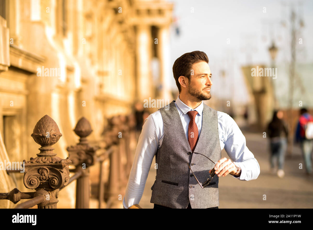 Successful man walking on street hi-res stock photography and images ...