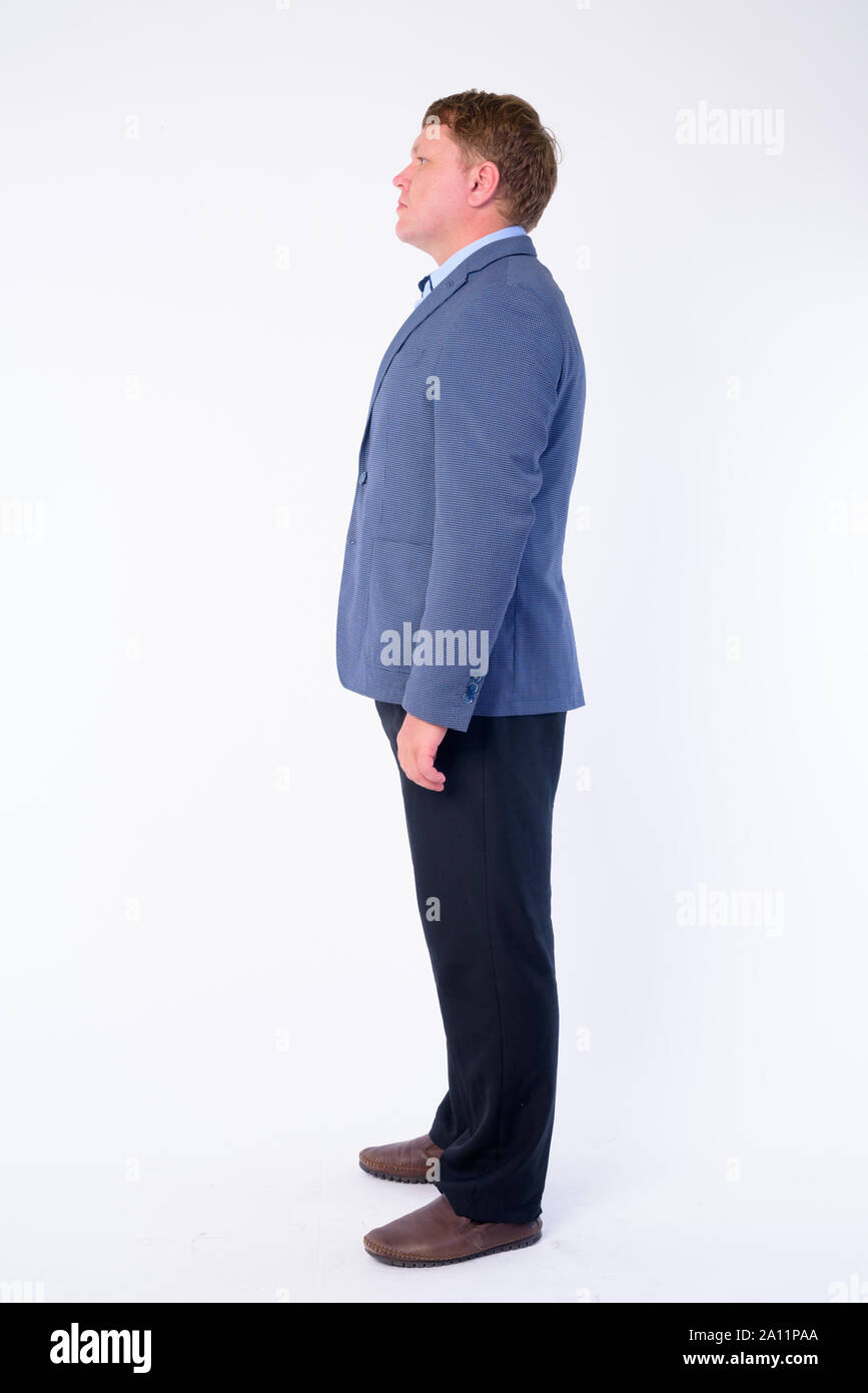 Full body shot profile view of overweight businessman in suit Stock ...