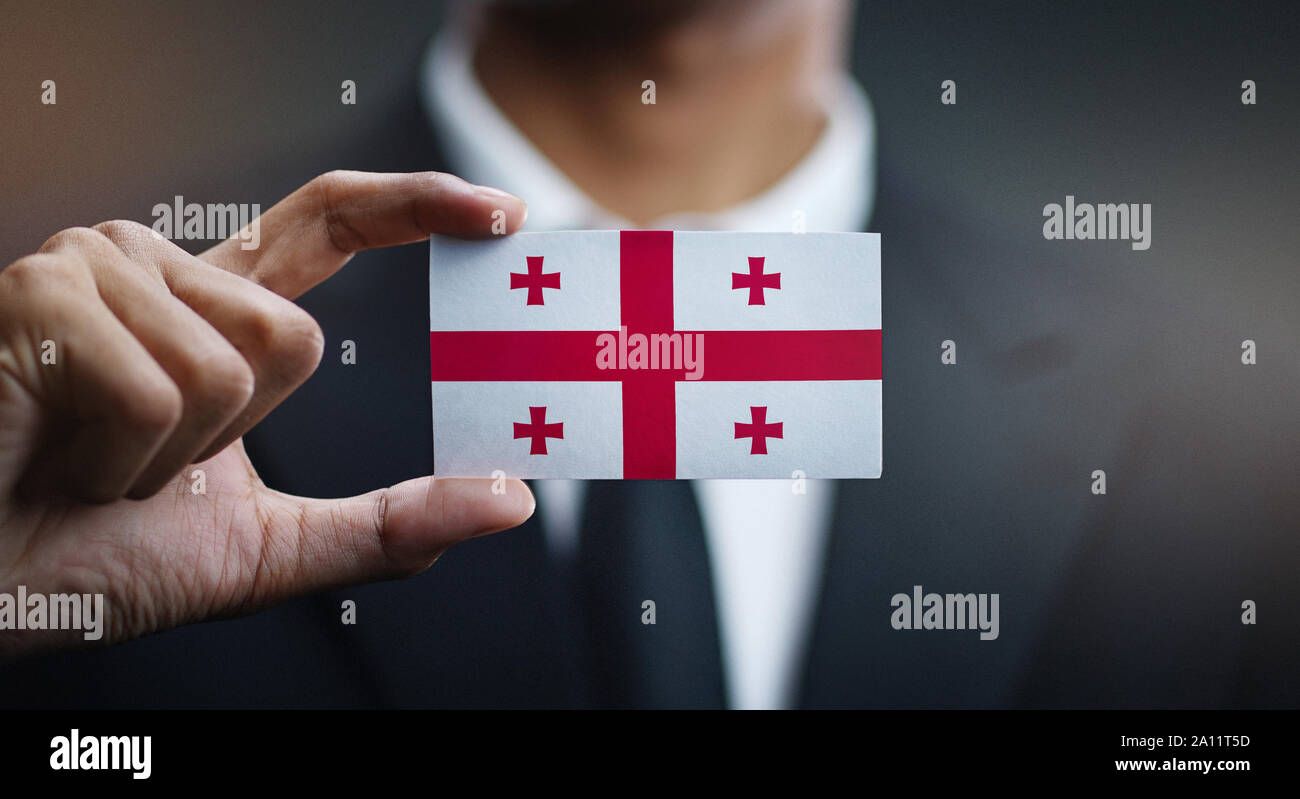 Georgia country flag hand hi-res stock photography and images - Alamy
