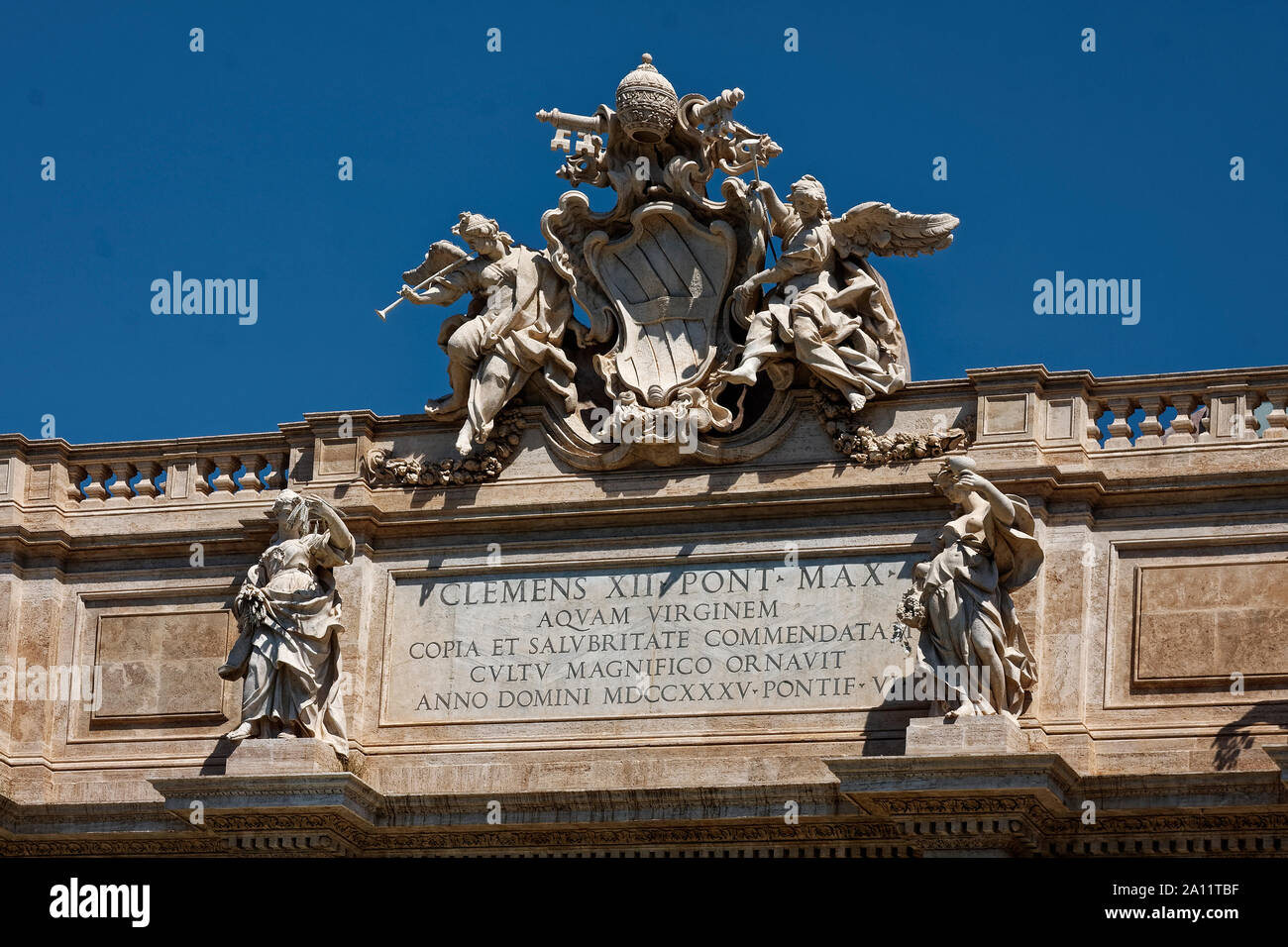 Trevi Fountain; top close-up; Papal coat of arms; 2 angels; Travertine ...