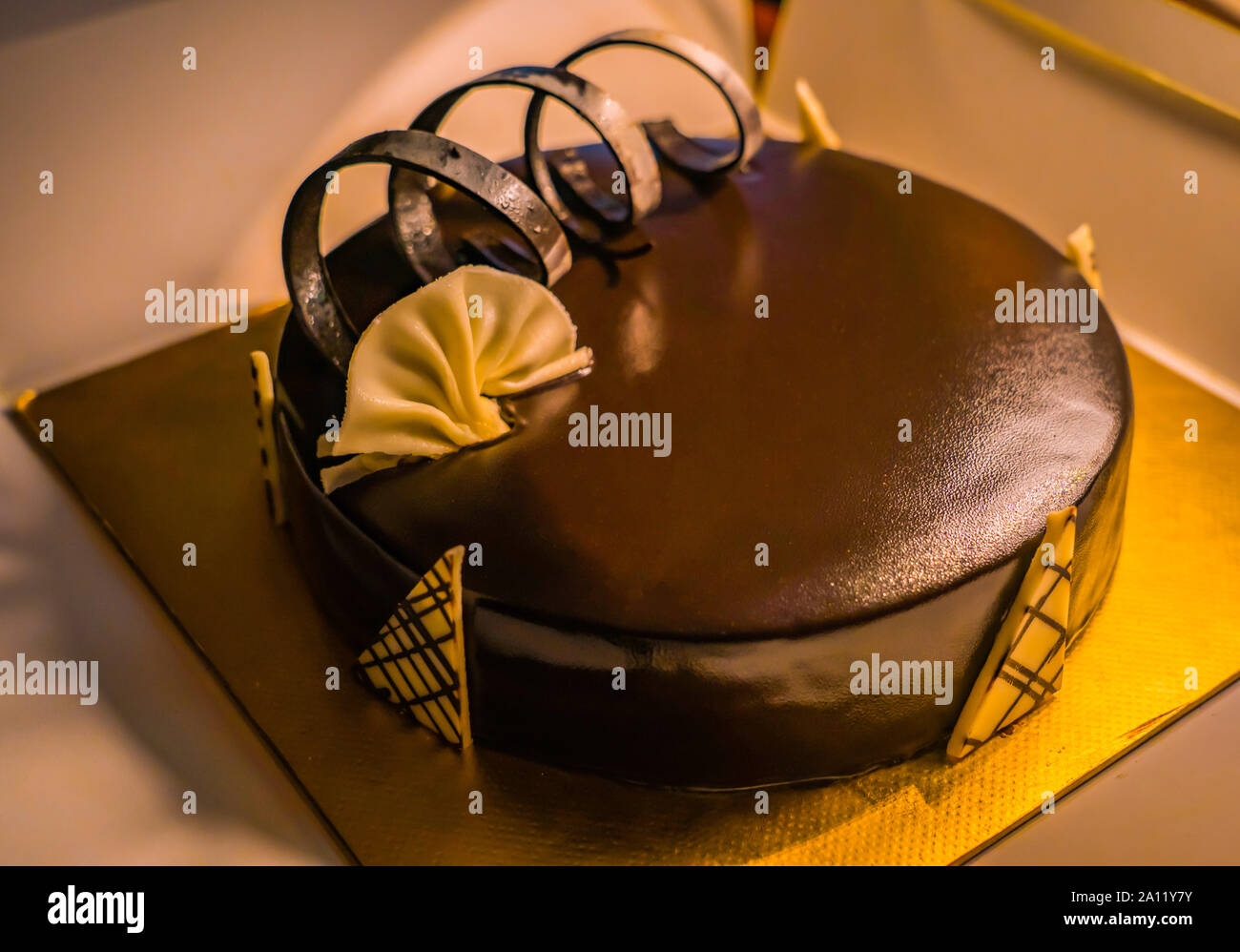 Chocolate Truffle Cake with a decoration on top Stock Photo - Alamy