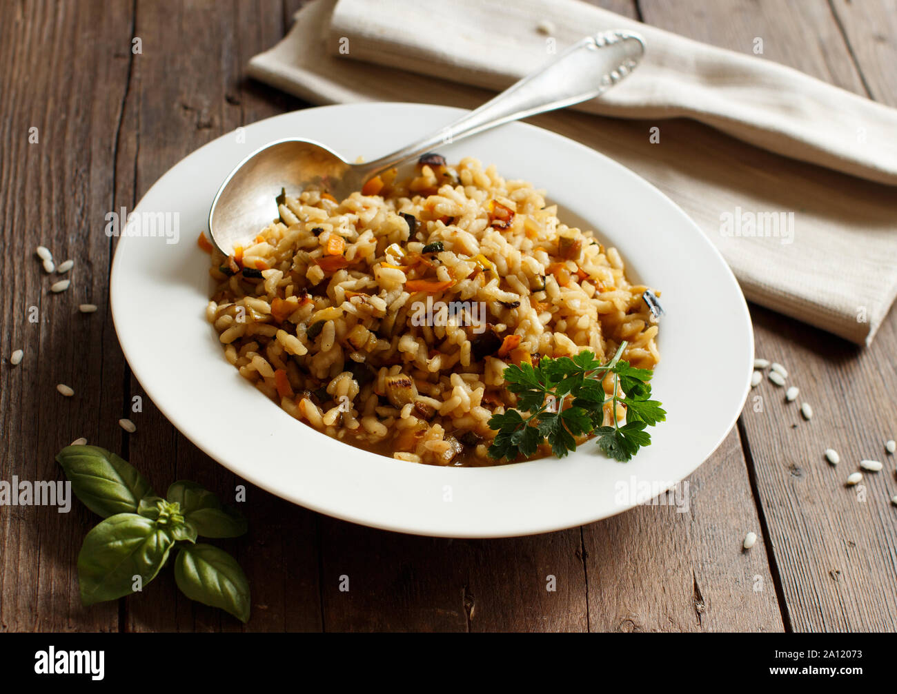 Risotto with vegetables and spices close up Stock Photo - Alamy