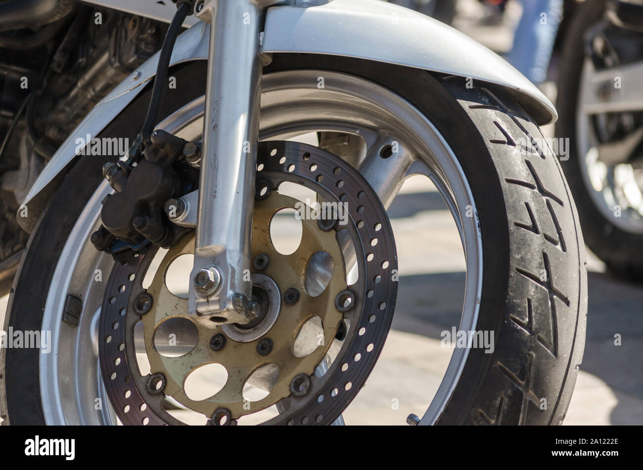 front wheel of a sports bike closeup Stock Photo - Alamy