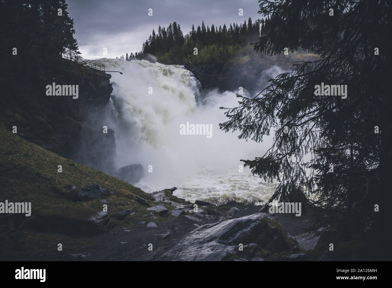 The biggest waterfall of Sweden. High water level of the river after ...