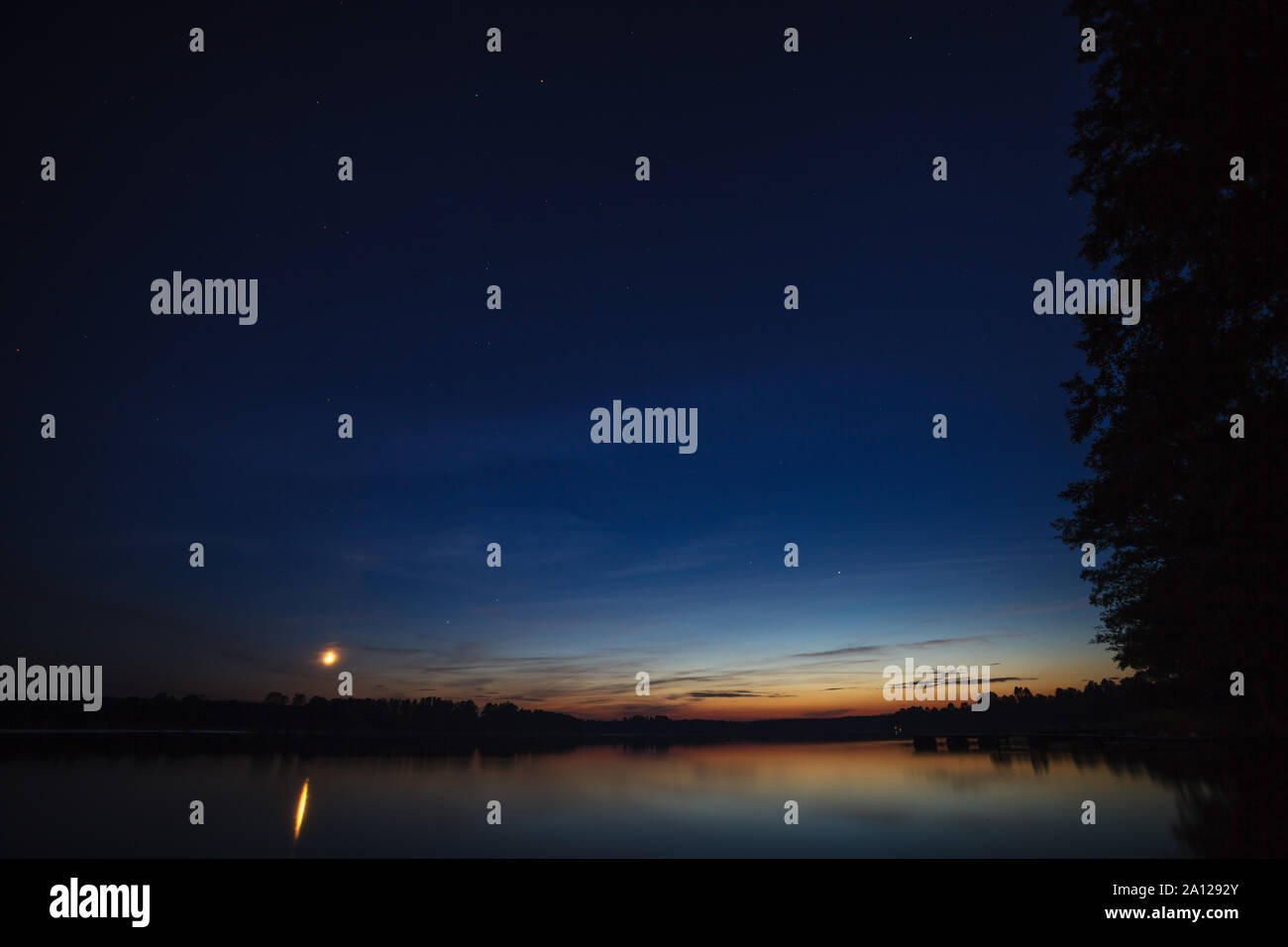 Night sky over the lake Stock Photo - Alamy