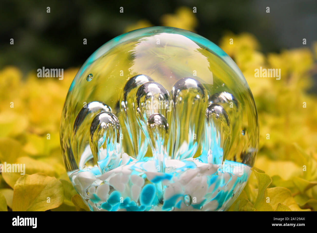 Glass decoration blue ball bubbles. Glass paperweight Stock Photo - Alamy