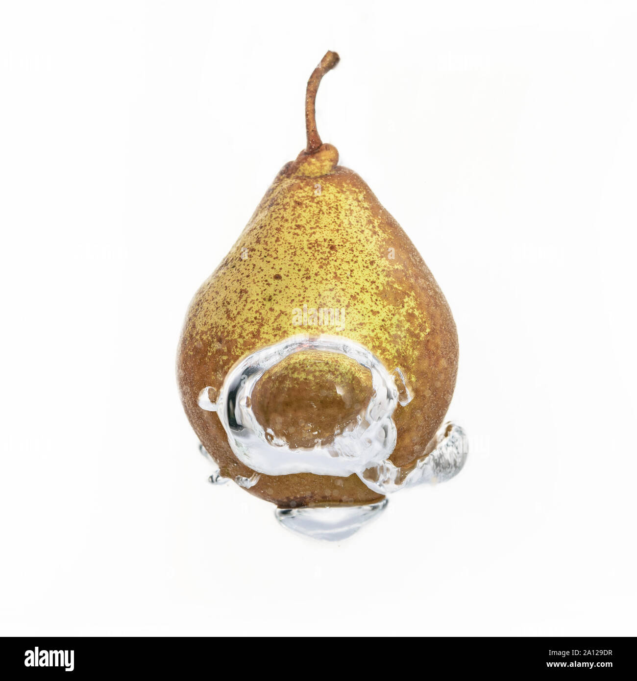 Beautiful fresh pear in water bubble white background Stock Photo - Alamy