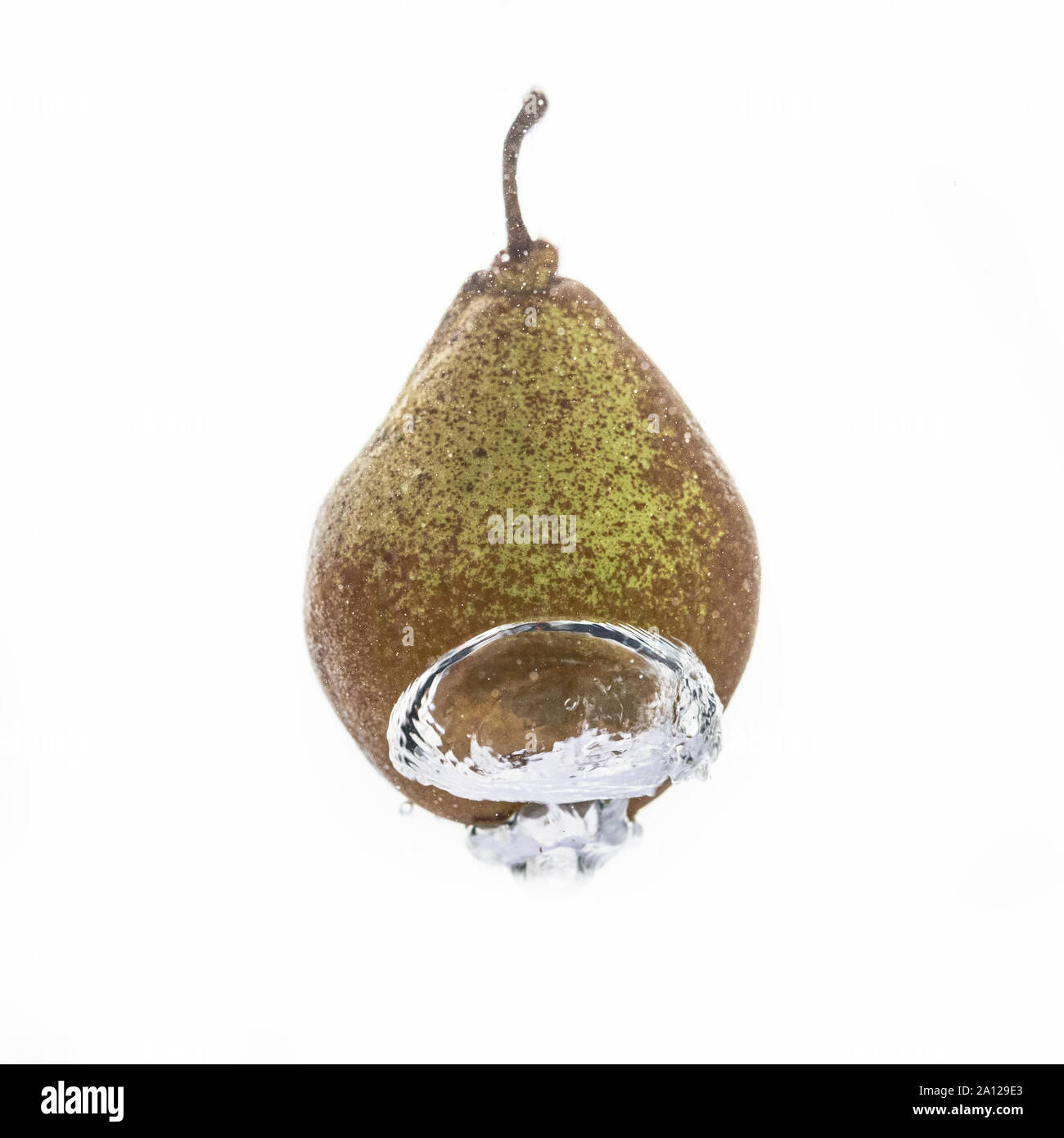 Beautiful fresh pear in water bubble white background Stock Photo - Alamy