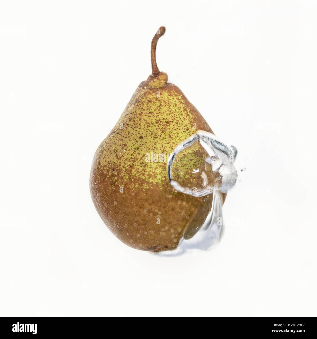 Beautiful fresh pear in water bubble white background Stock Photo - Alamy