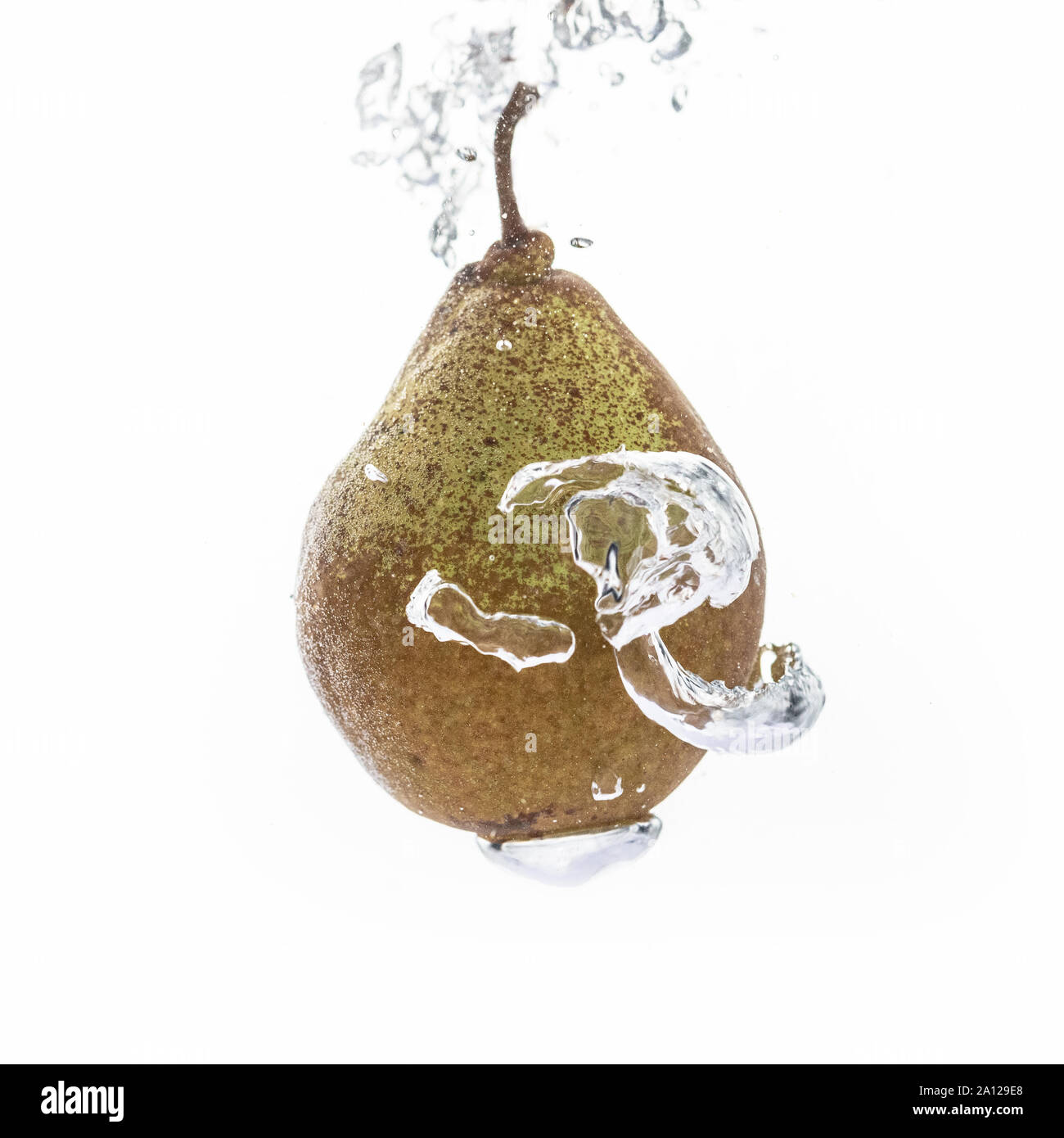 Beautiful fresh pear in water bubble white background Stock Photo - Alamy