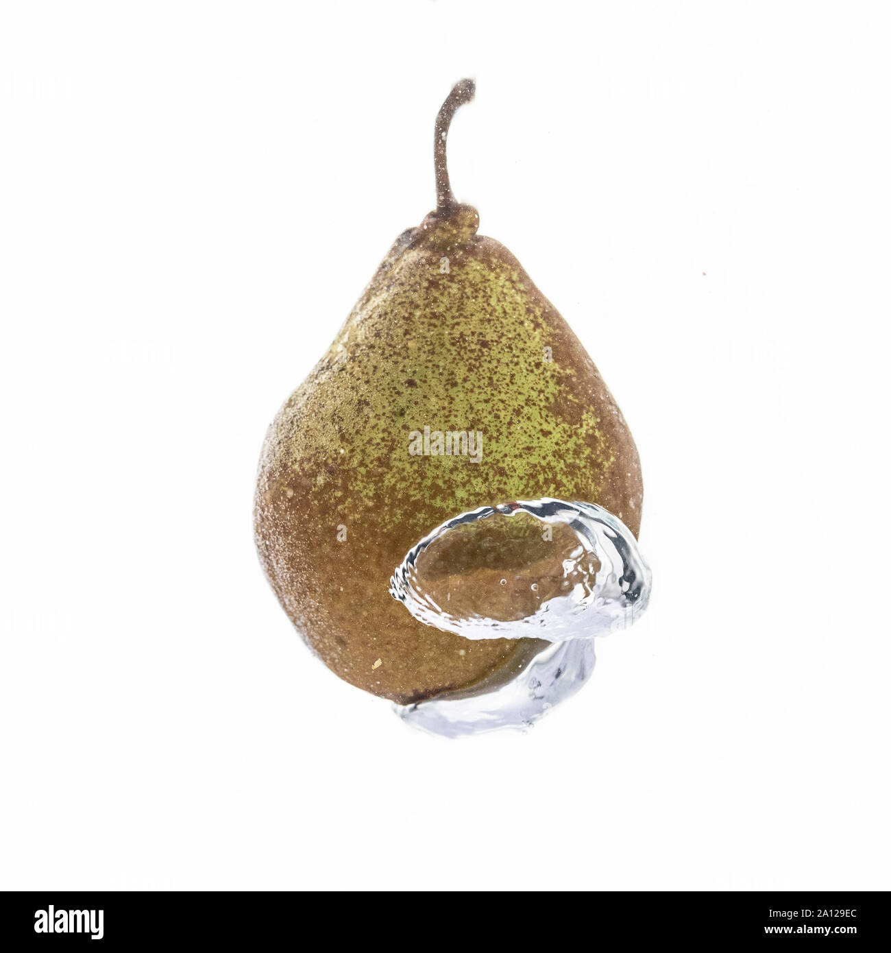 Beautiful fresh pear in water bubble white background Stock Photo - Alamy