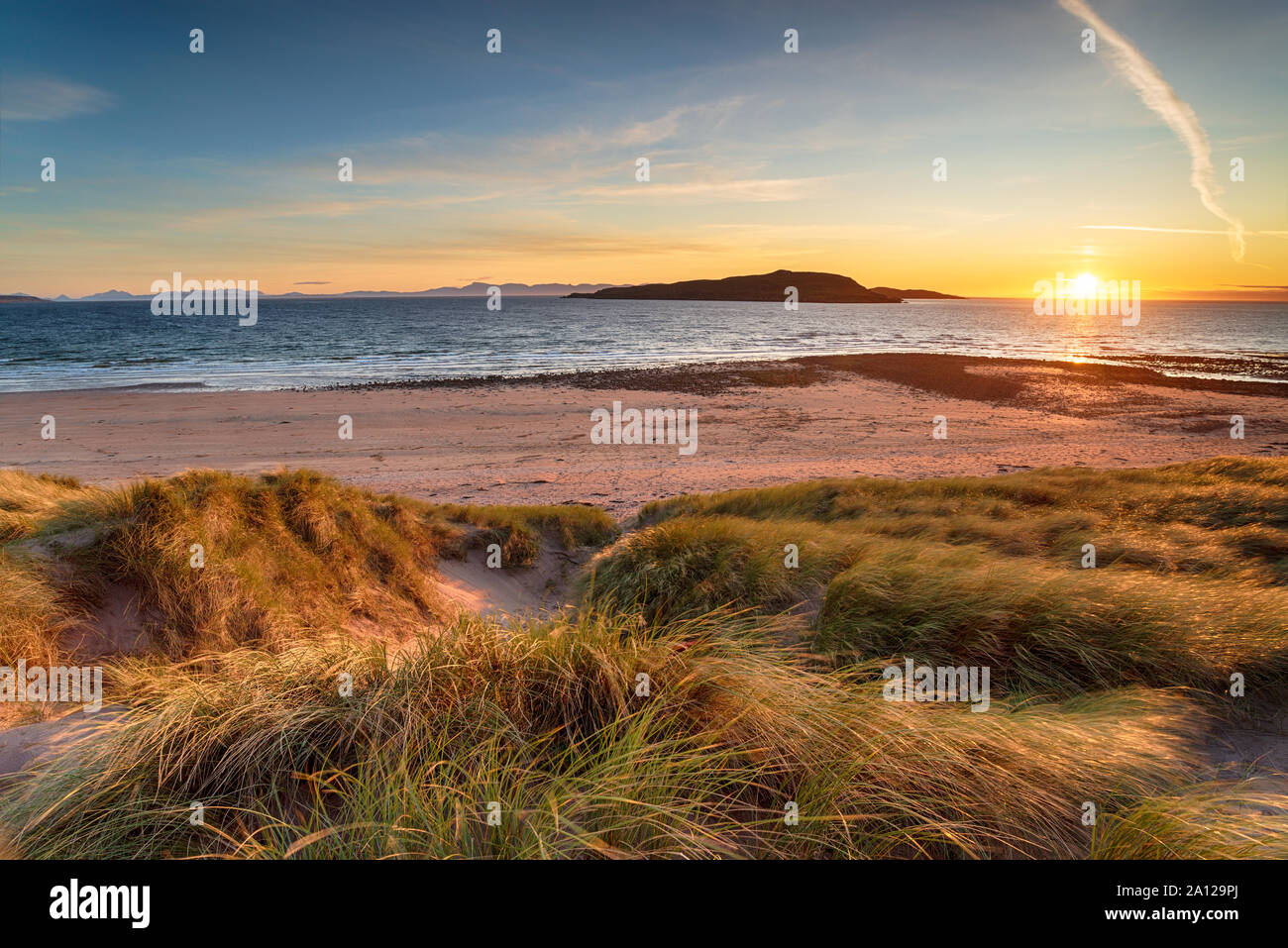 Sunset over Big Sand beach at Gairloch in Scotland, looking out to ...