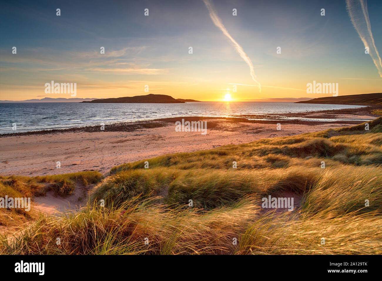 Sunset over the dunes at Big Sand Beah at Gairloch in the Highlands of ...