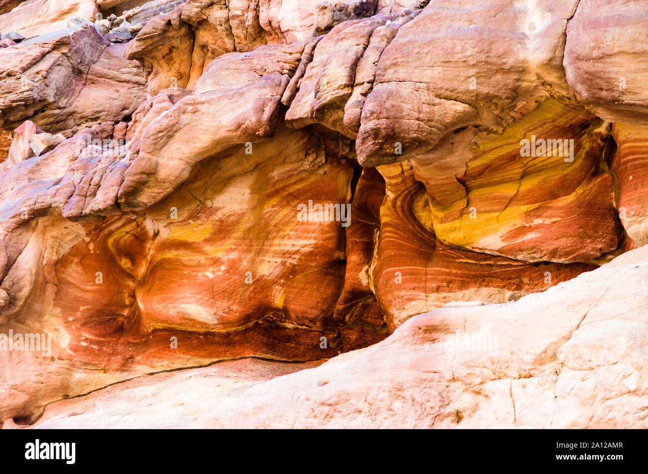 texture of orange stone rock in a colored canyon closeup Stock Photo ...
