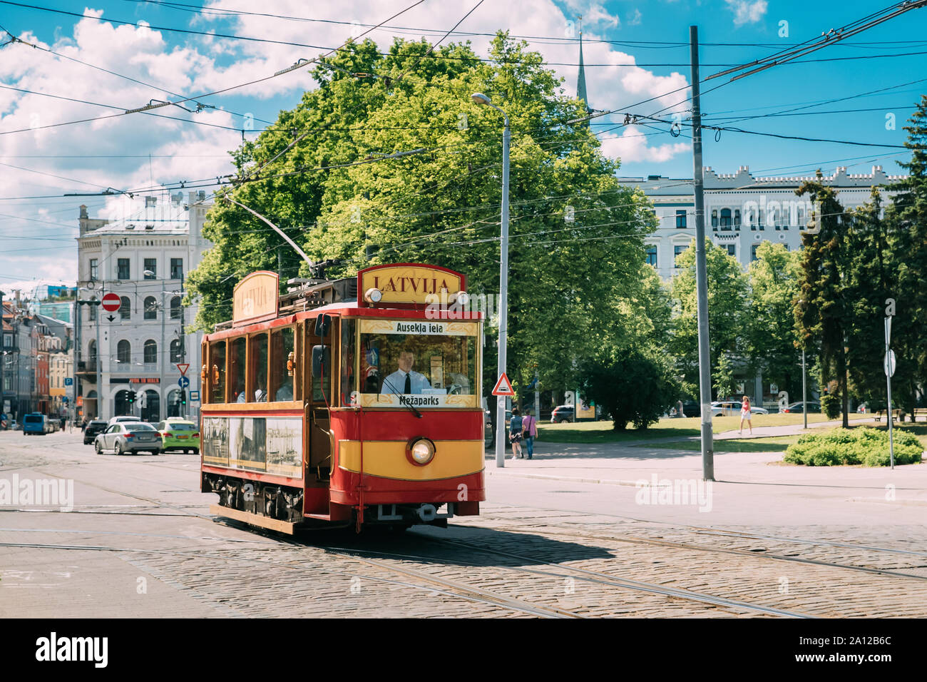 Riga, Latvia - June 9, 2019: Red retro Vintage Public Tram In Street In ...