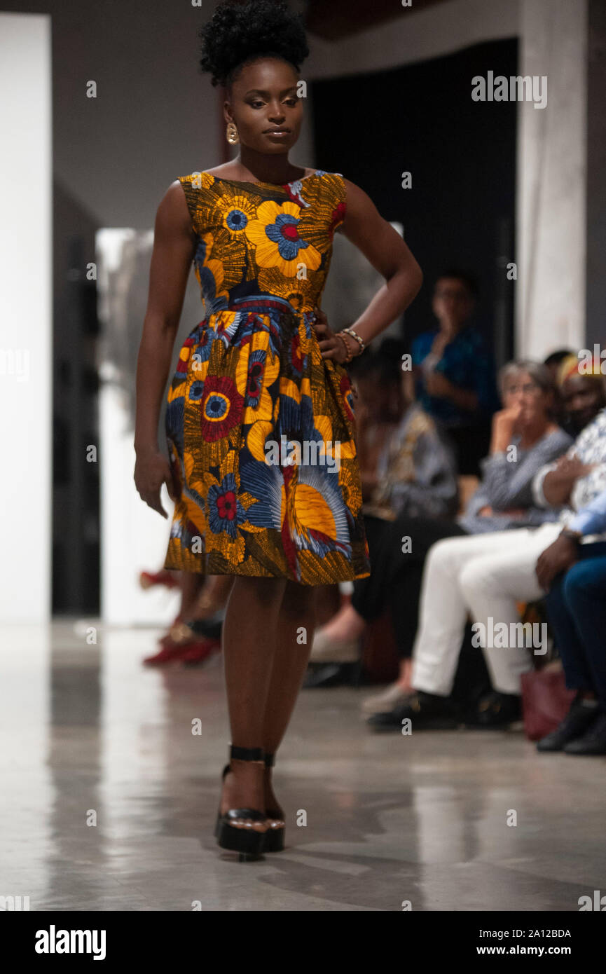 A model showcases a fashion design for Nebua during the event.The ...