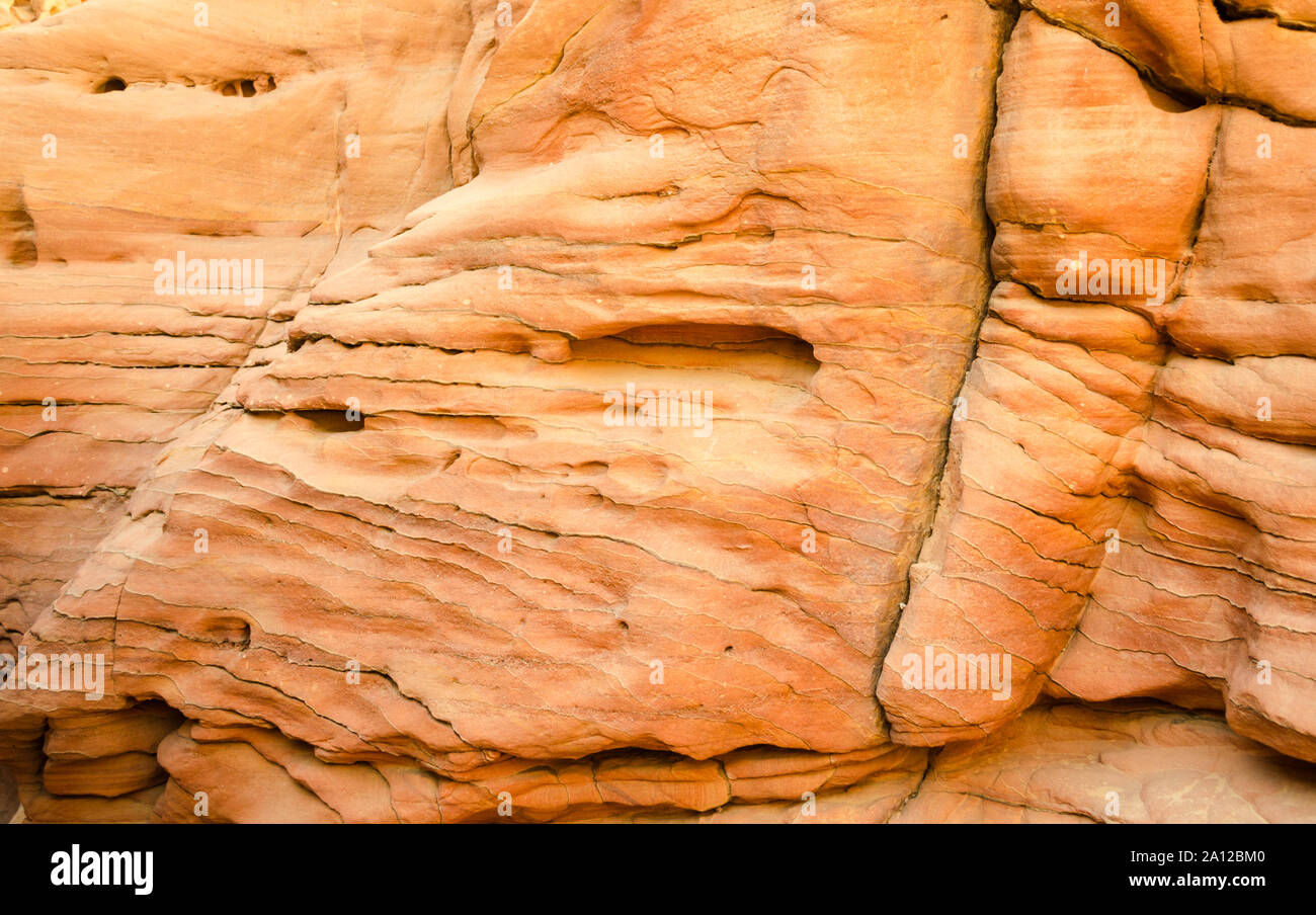 texture of orange stone rock in a colored canyon closeup Stock Photo ...