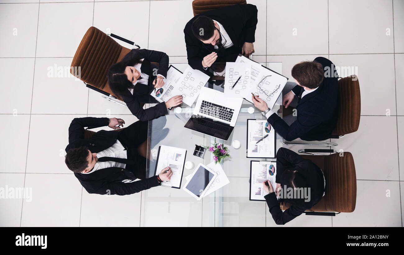 CEO and the business team at a working meeting Stock Photo - Alamy