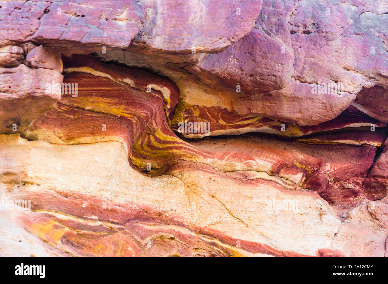 texture of orange stone rock in a colored canyon closeup Stock Photo ...