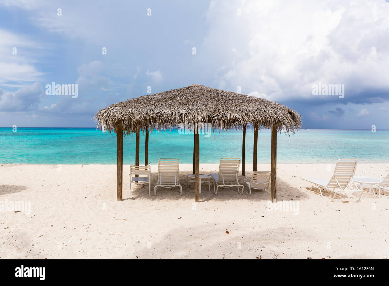 A cabana sun shelter on a sandy beach Stock Photo - Alamy