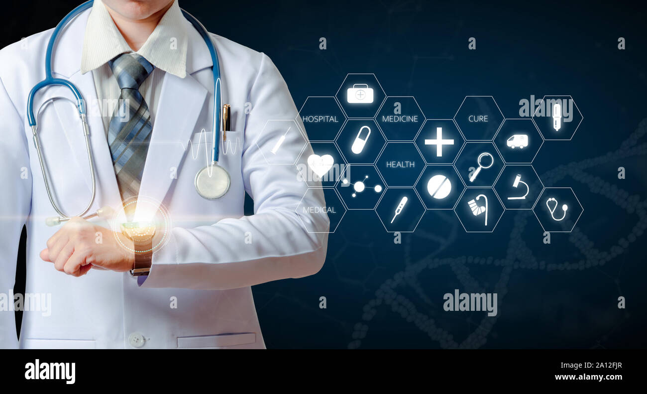 woman doctor holding hand up and using smart watch with futuristic ...