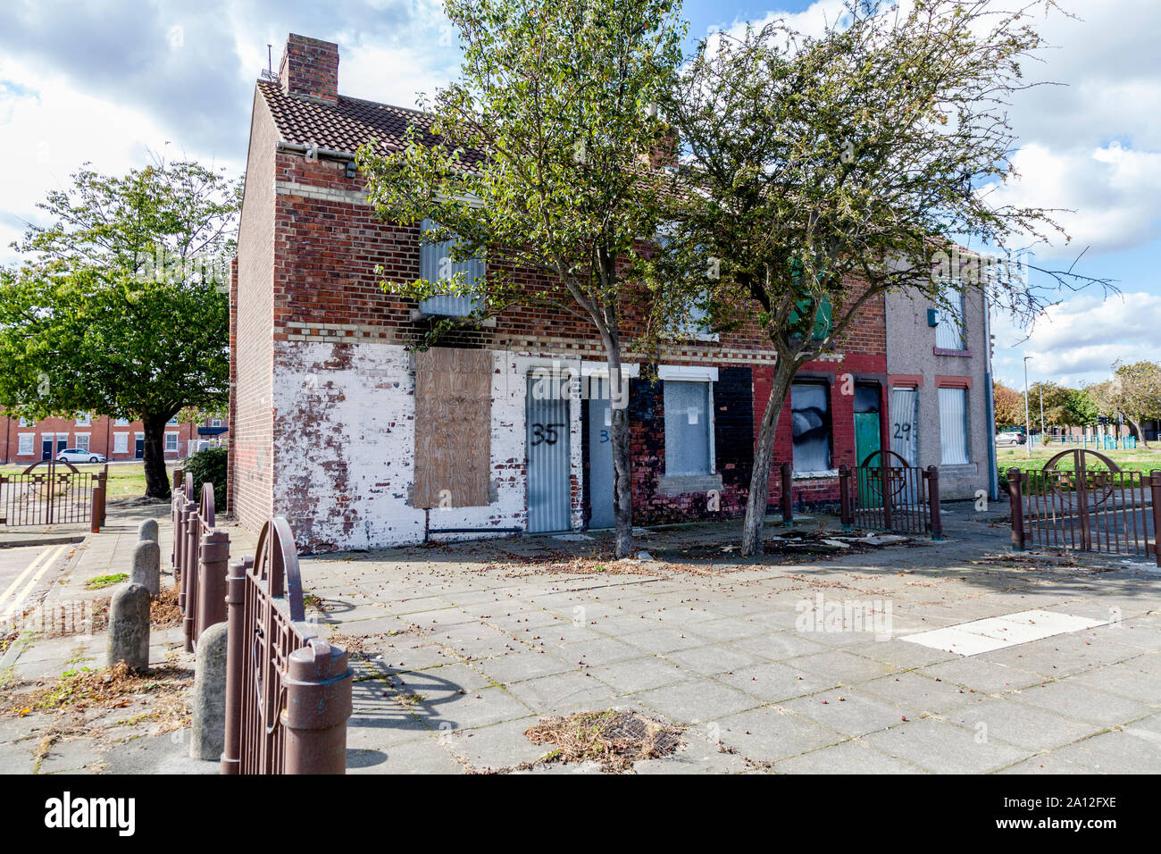 Boarded up council houses in hi-res stock photography and images - Alamy
