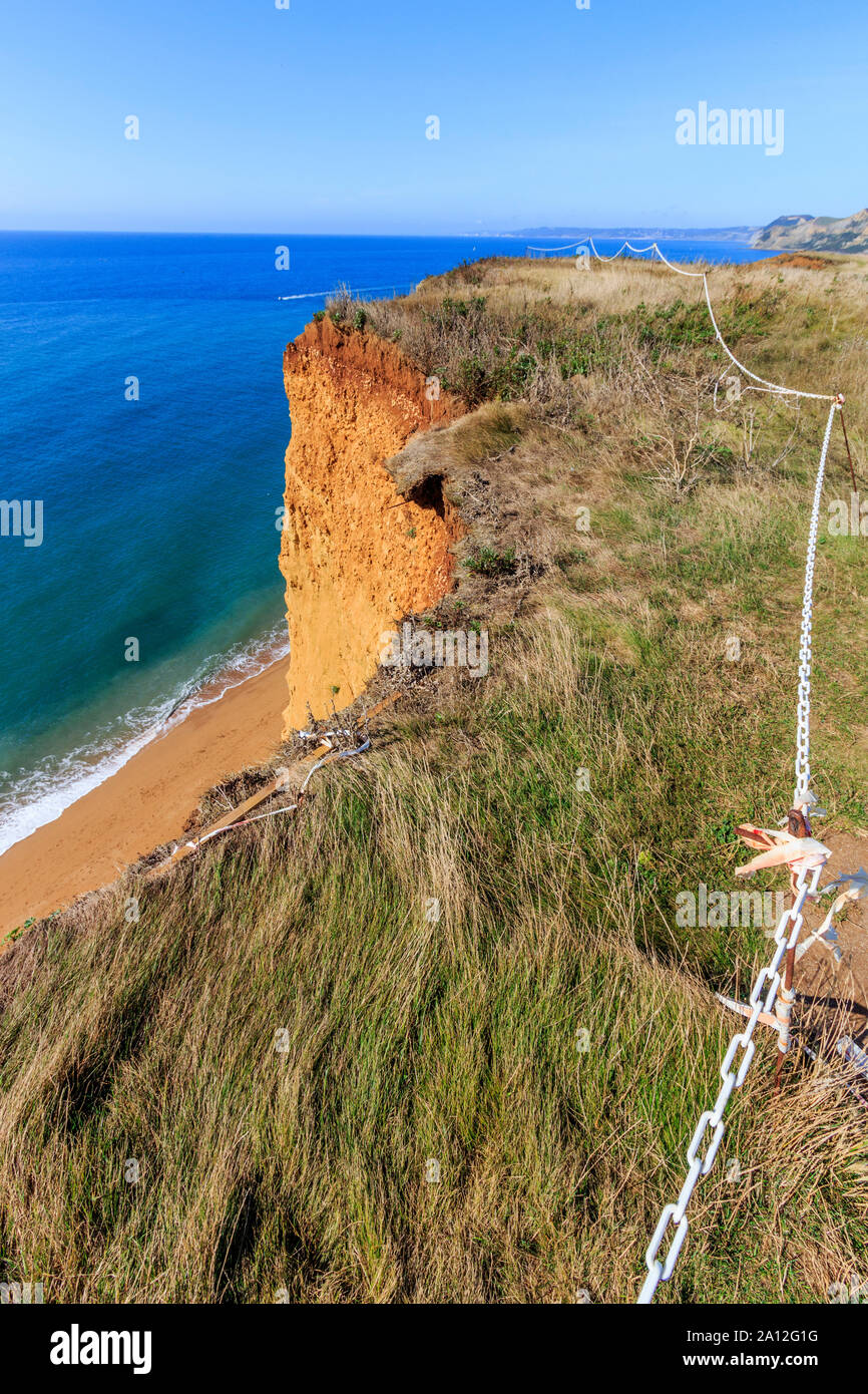cliff falls roped off area danger, west bay coast resort, jurassic ...