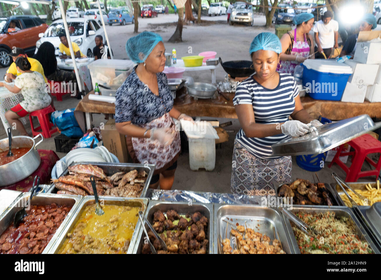 MAHE, SEYCHELLES - AUGUST 13 2019 - Young creole people at local market ...