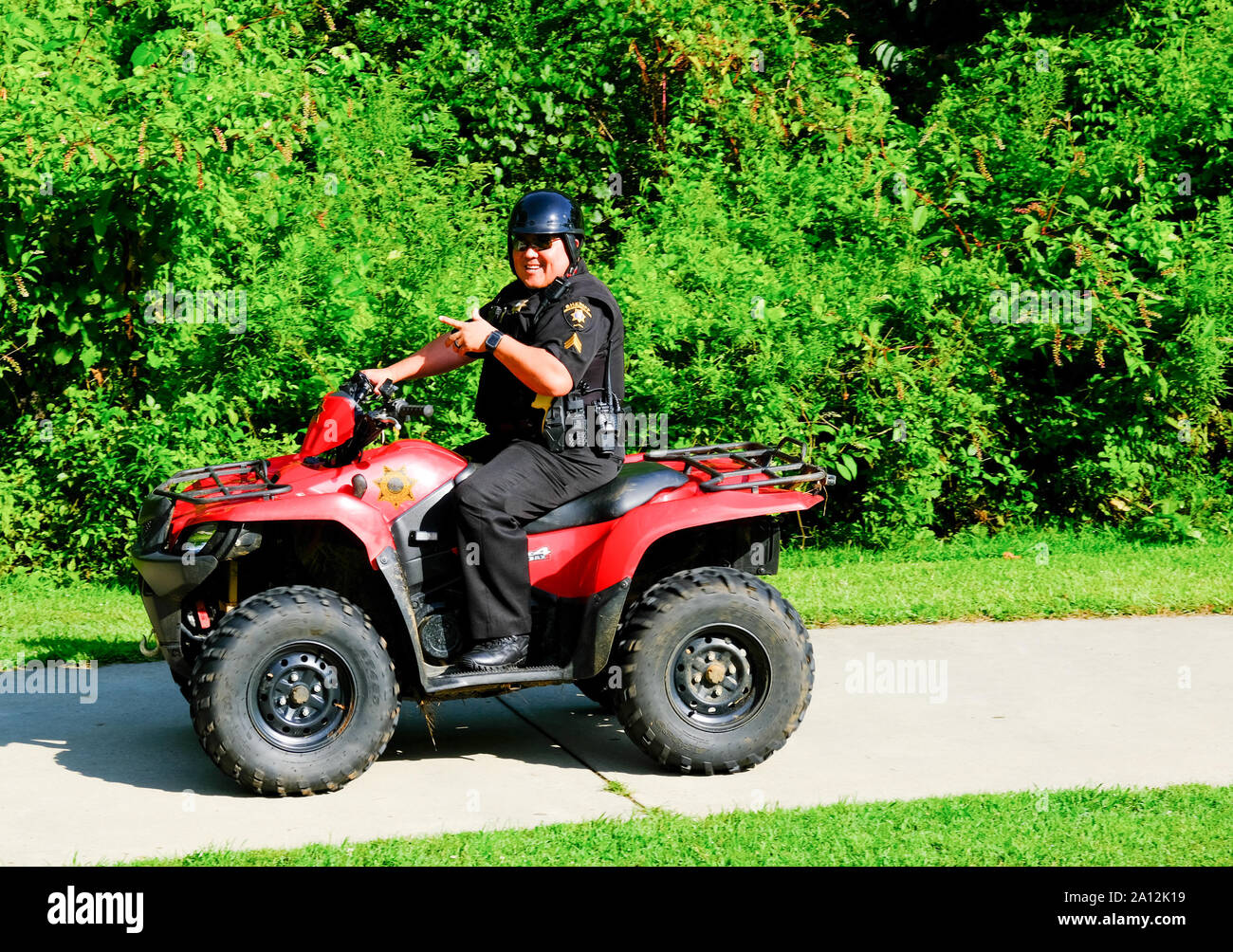 Sheriff on Four Wheeler Stock Photo - Alamy