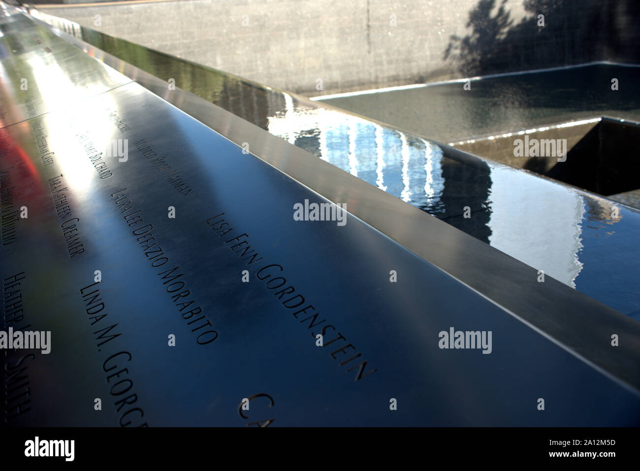 Inscription panels, waterfalls and reflecting pools at the National ...