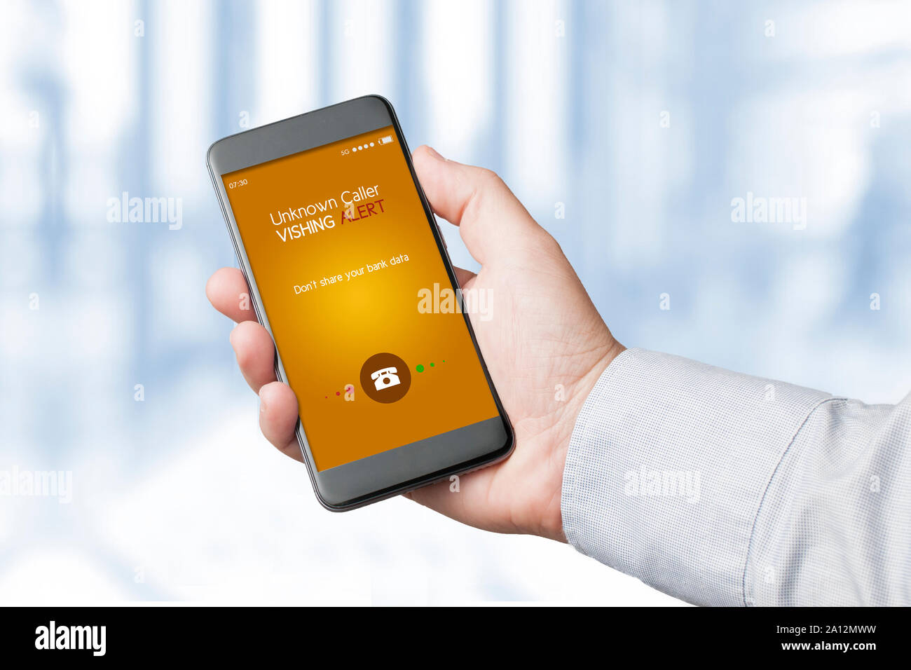 Vishing (voice phishing) concept, business man in blue shirt hold a ...