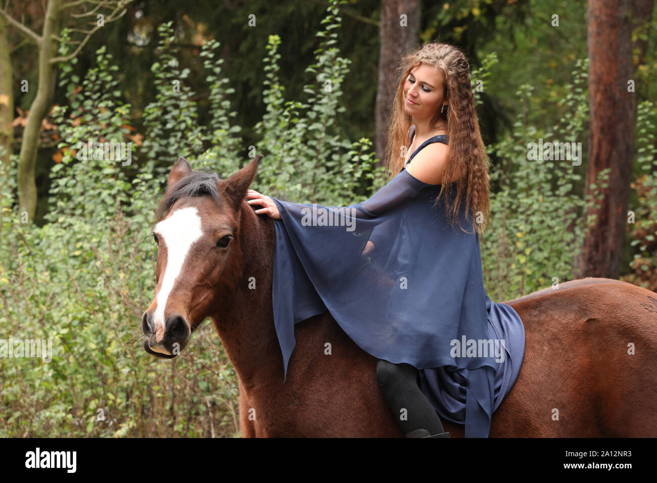 Riding pony two woman girl hi-res stock photography and images - Alamy