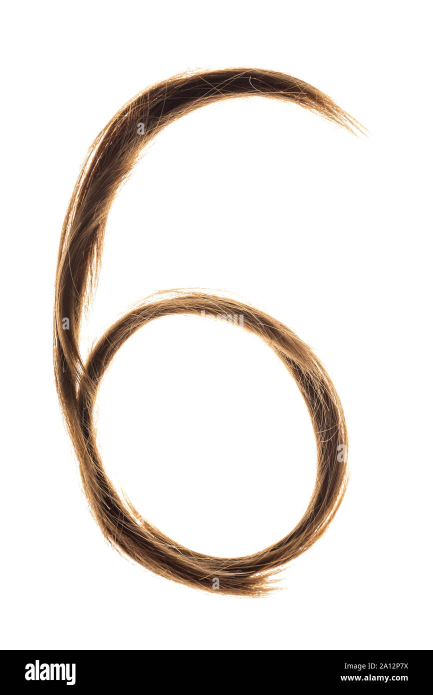 Number 6 made from cut out woman hair, isolated on white background ...