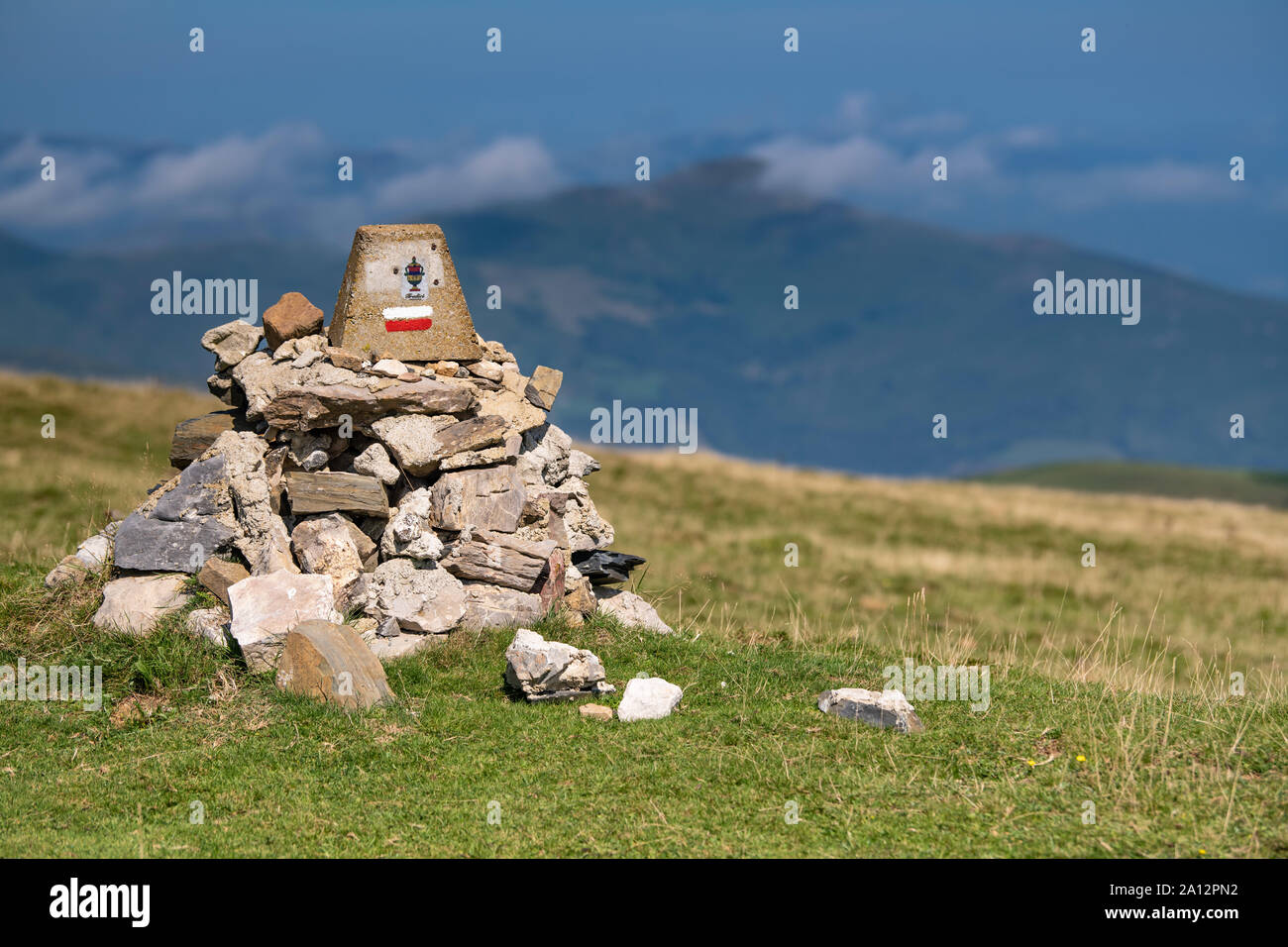 Cairn, Pile of stones on a trail in the Basque Country Stock Photo - Alamy