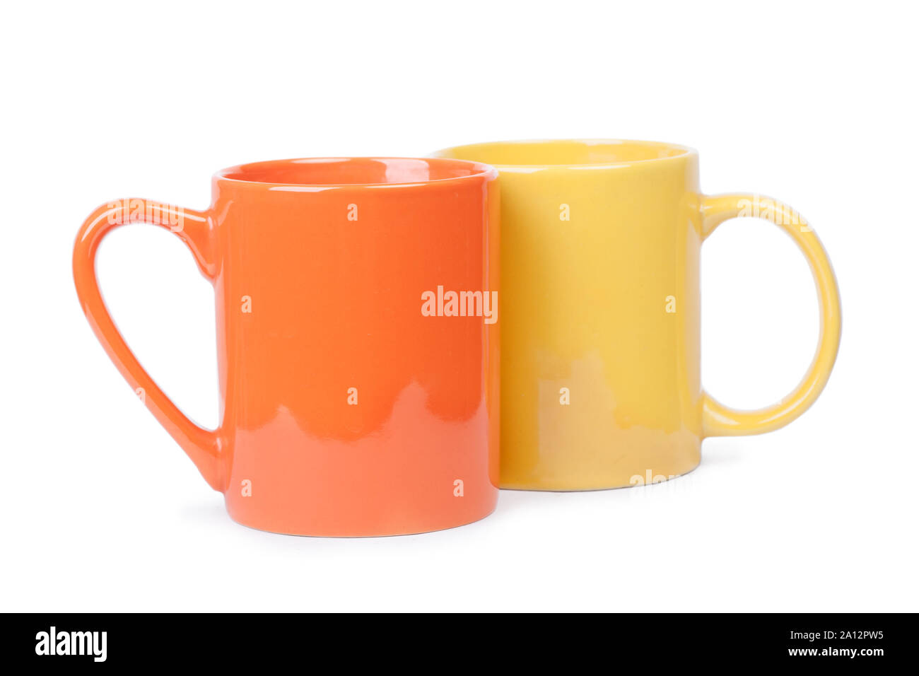 Two mugs isolated on white background Stock Photo - Alamy