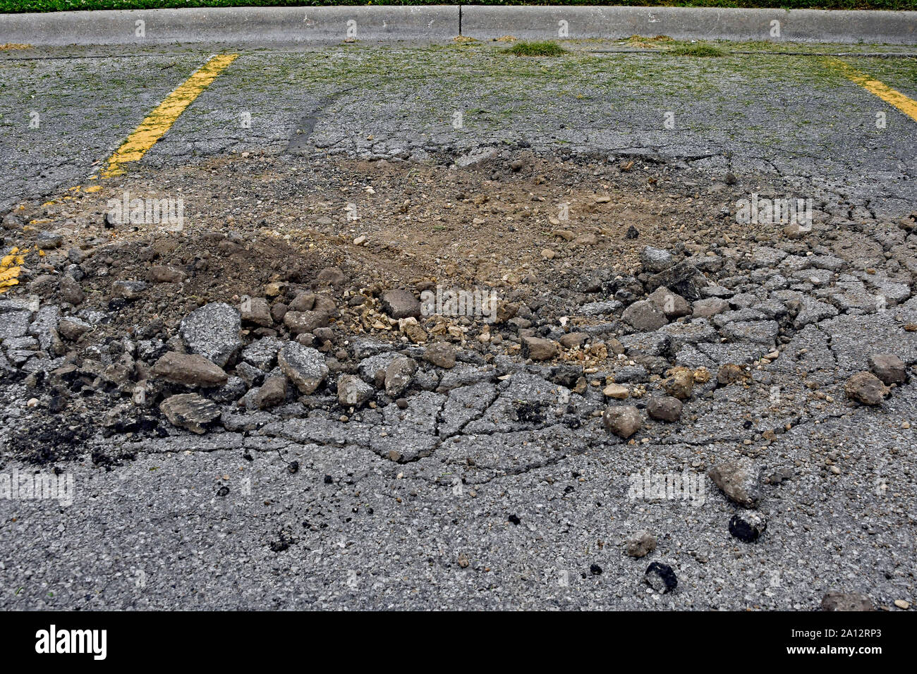 Emporia, Kansas, USA, September 20, 2019Example of broken asphalt ...