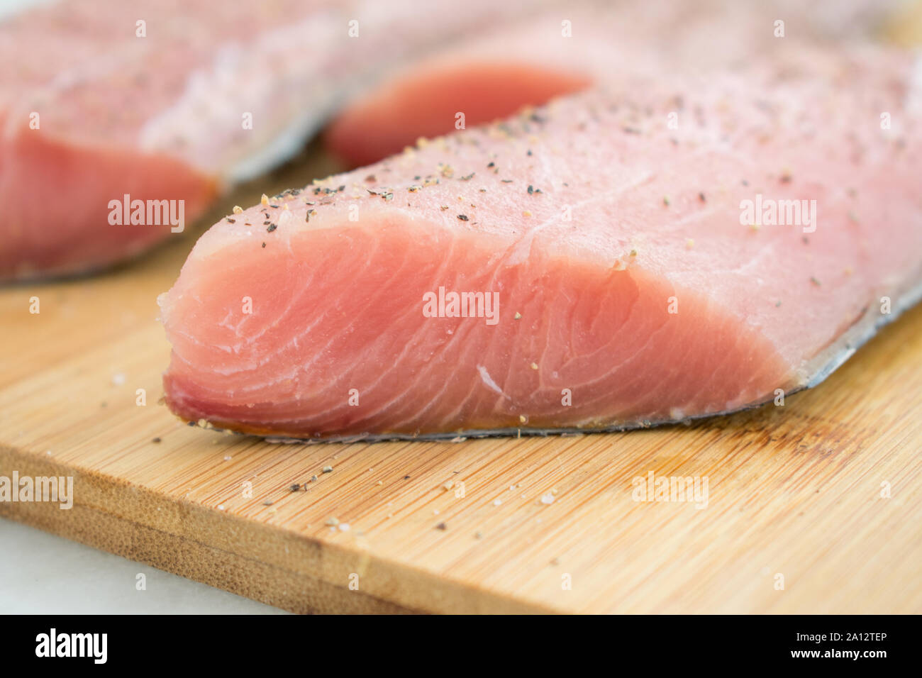 Raw Mahi Mahi (Dolphin Fish) Fillets on a Cutting Board: Raw fish ...