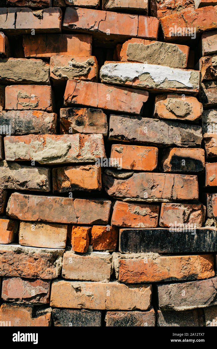 abstract background of piled old red bricks Stock Photo - Alamy