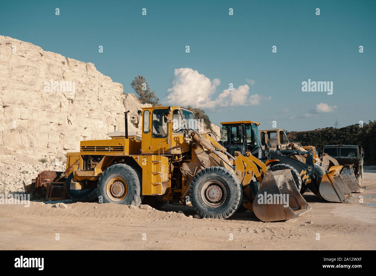 Heavy machinery in quarry. Building materials mining Stock Photo - Alamy