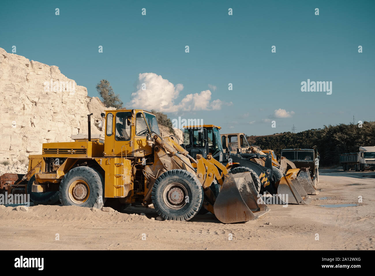 Heavy machinery in quarry. Building materials mining Stock Photo - Alamy