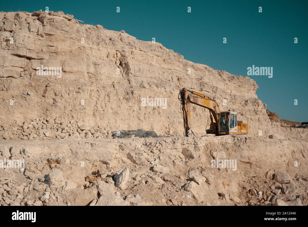 Heavy machinery in quarry. Building materials mining Stock Photo - Alamy